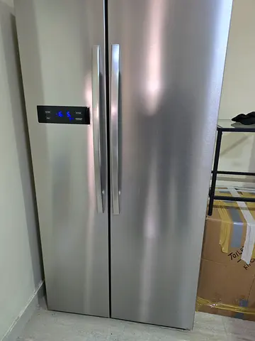 Classifieds: Large stainless steel side-by-side refrigerator with ...