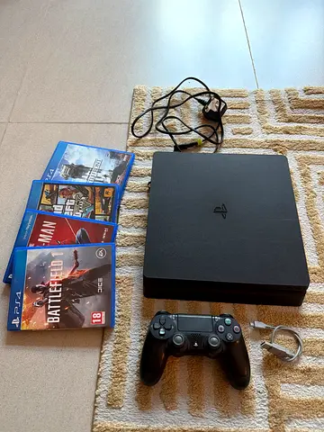 Classifieds: Sony PlayStation 4 Slim with controller, cables and 4 ...