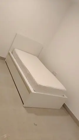 Classifieds: Single white bed frame with mattress and storage ...