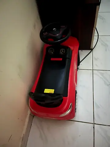 Classifieds: Red Ride-On Kids Car Toy with Steering Wheel - Good ...