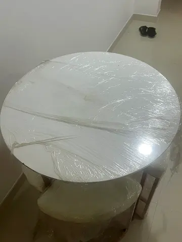 Classifieds: White round table with 4 chairs. | dubizzle Sharjah