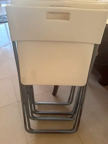 Classifieds: Stack of 4 white plastic stools with metal legs | dubizzle ...