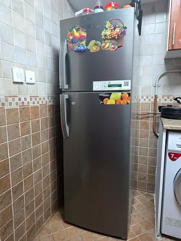 Classifieds: Used double-door refrigerator with bottom freezer - good ...