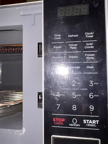 Classifieds: Brand new but some scratches countertop microwave oven ...