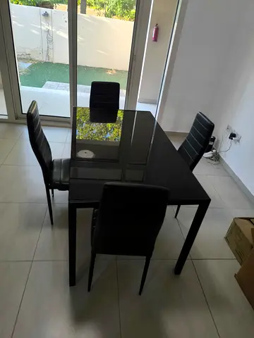 Classifieds: Glass Top Dining Table with 6 Black Leather Chairs - Good ...