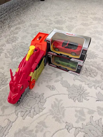 Classifieds: Toy Dragon Truck with 2 Die-Cast Cars | dubizzle Dubai