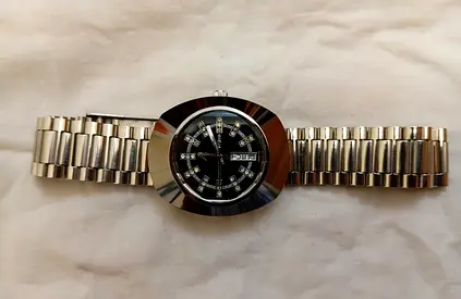 Classifieds: Mens silver-tone wristwatch with black crystal dial ...