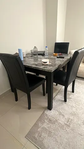 Classifieds: 4-Seater Marble Top Dining Table with Black Faux Leather ...